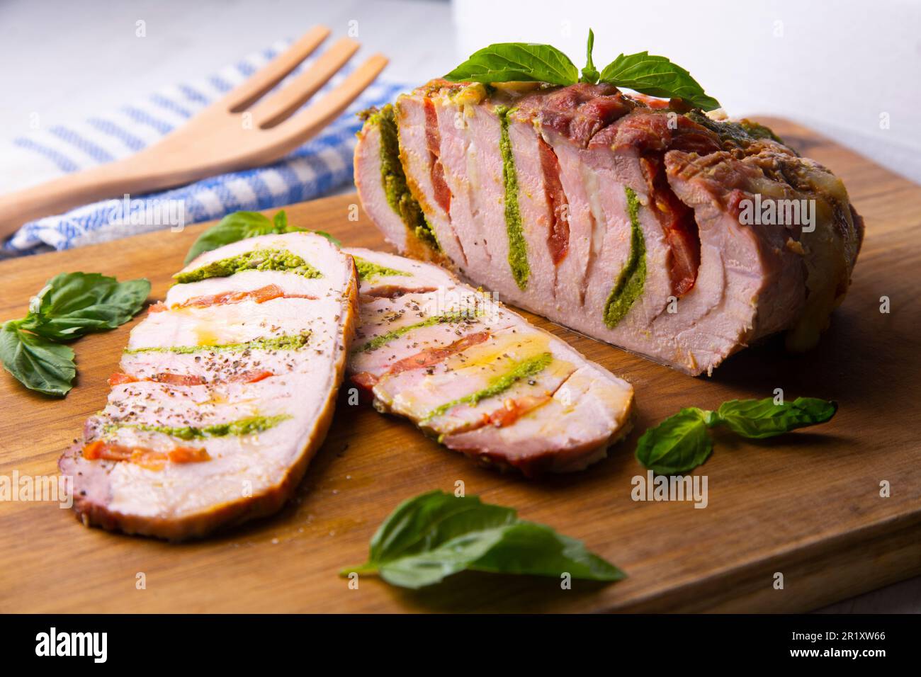 Italian style pork loin stuffed with pesto sauce, mozzarella and tomato ...
