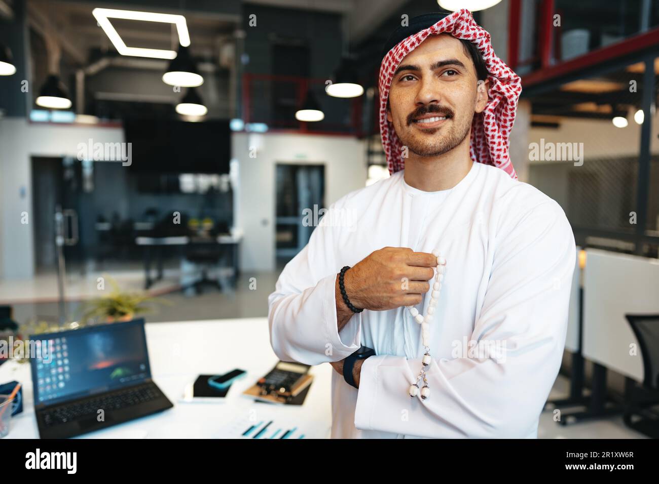 Successful muslim businessmen in traditional outfit in his office Stock ...
