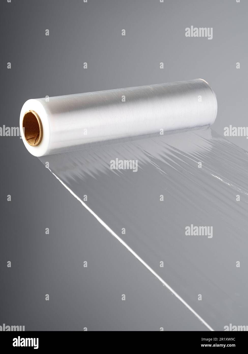 Roll of transparent polyethylene cling film on gray background Stock ...