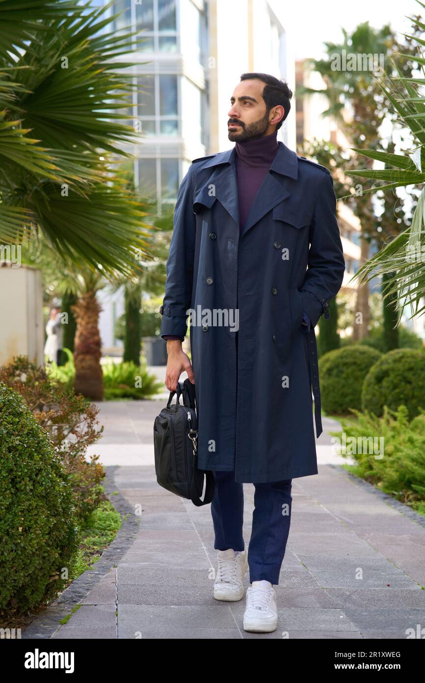 Muslim businessman walking. Arab businessman Stock Photo - Alamy