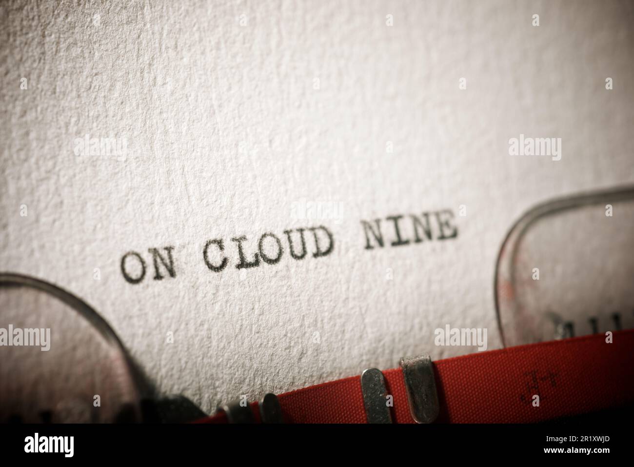 On cloud nine text written with a typewriter Stock Photo - Alamy