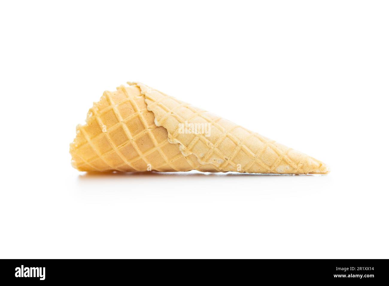 Empty wafer cone. Sweet ice cream cornet isolated on the white ...