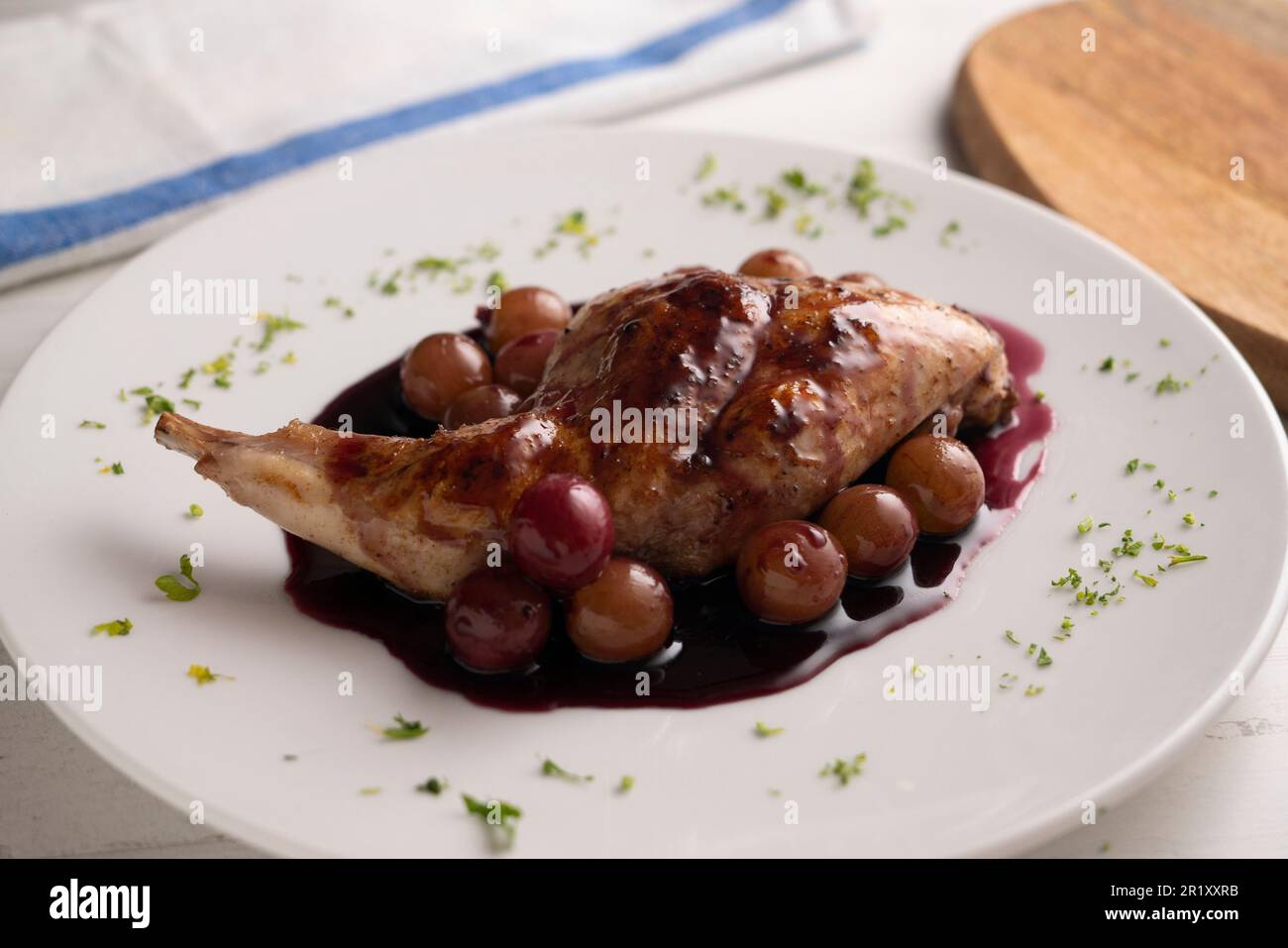 Wild rabbit cooked with wine sauce. Traditional recipe in Spain Stock ...