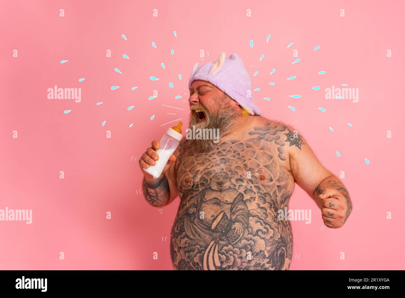 Fat man acts like with a child a baby bottle in hand Stock Photo - Alamy