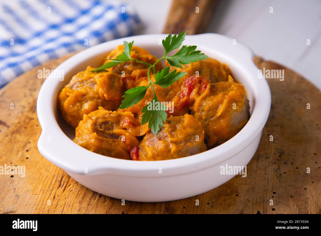 Meatballs with tomato sauce. A meatball is a popular culinary ...