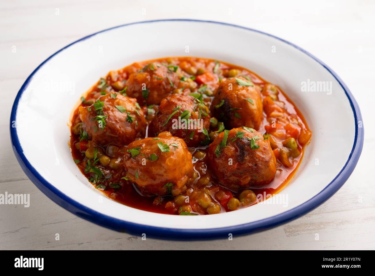 Meatballs with tomato sauce. A meatball is a popular culinary ...