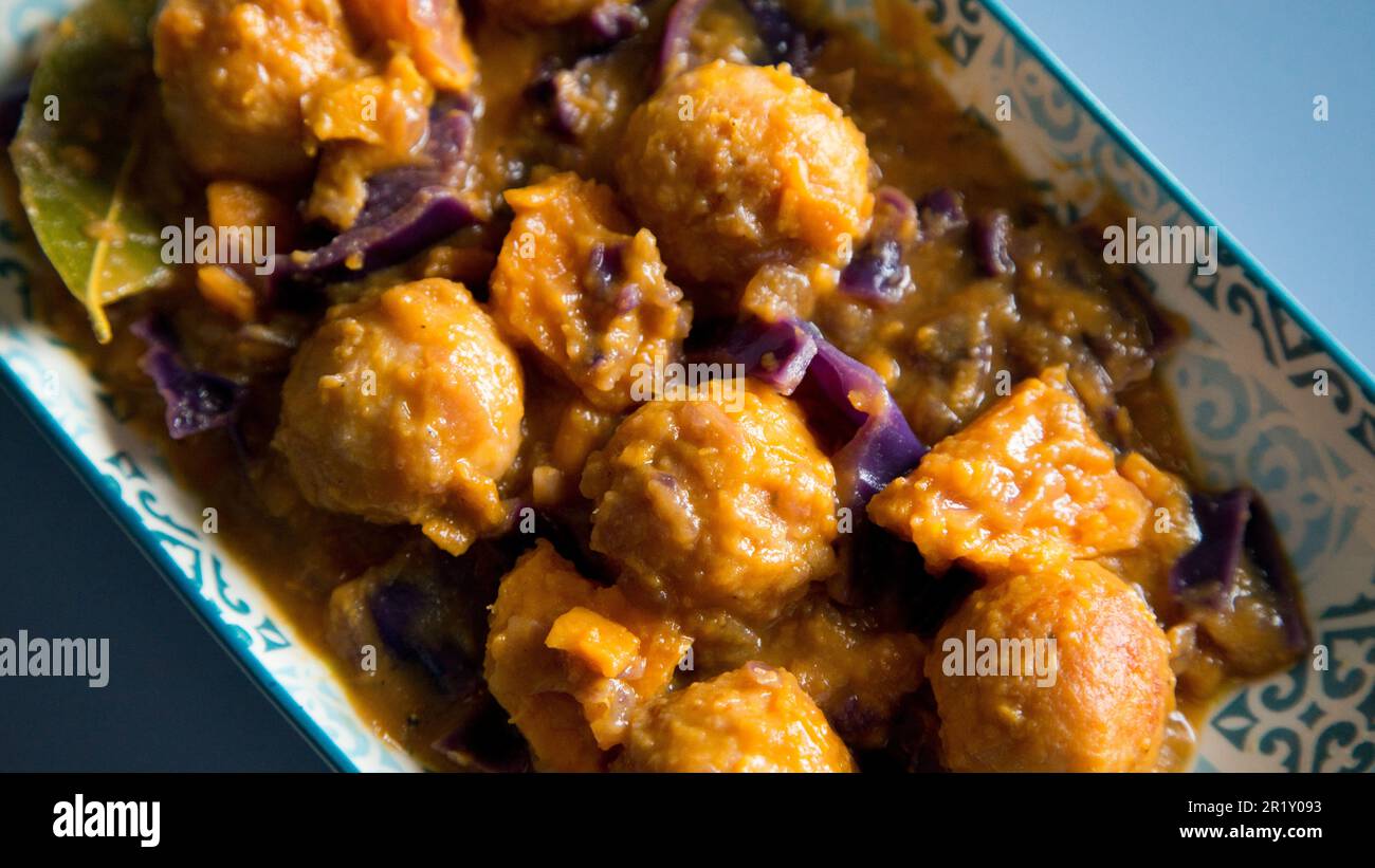 Turkey meatballs with red cabbage. A meatball is a popular culinary ...