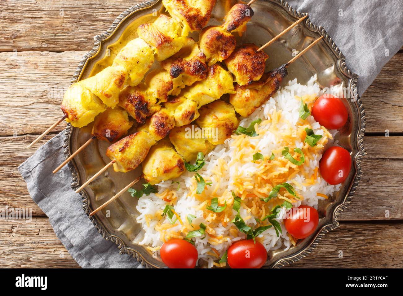 Persian Jujeh kabab is an Iranian dish that consists of grilled chunks ...