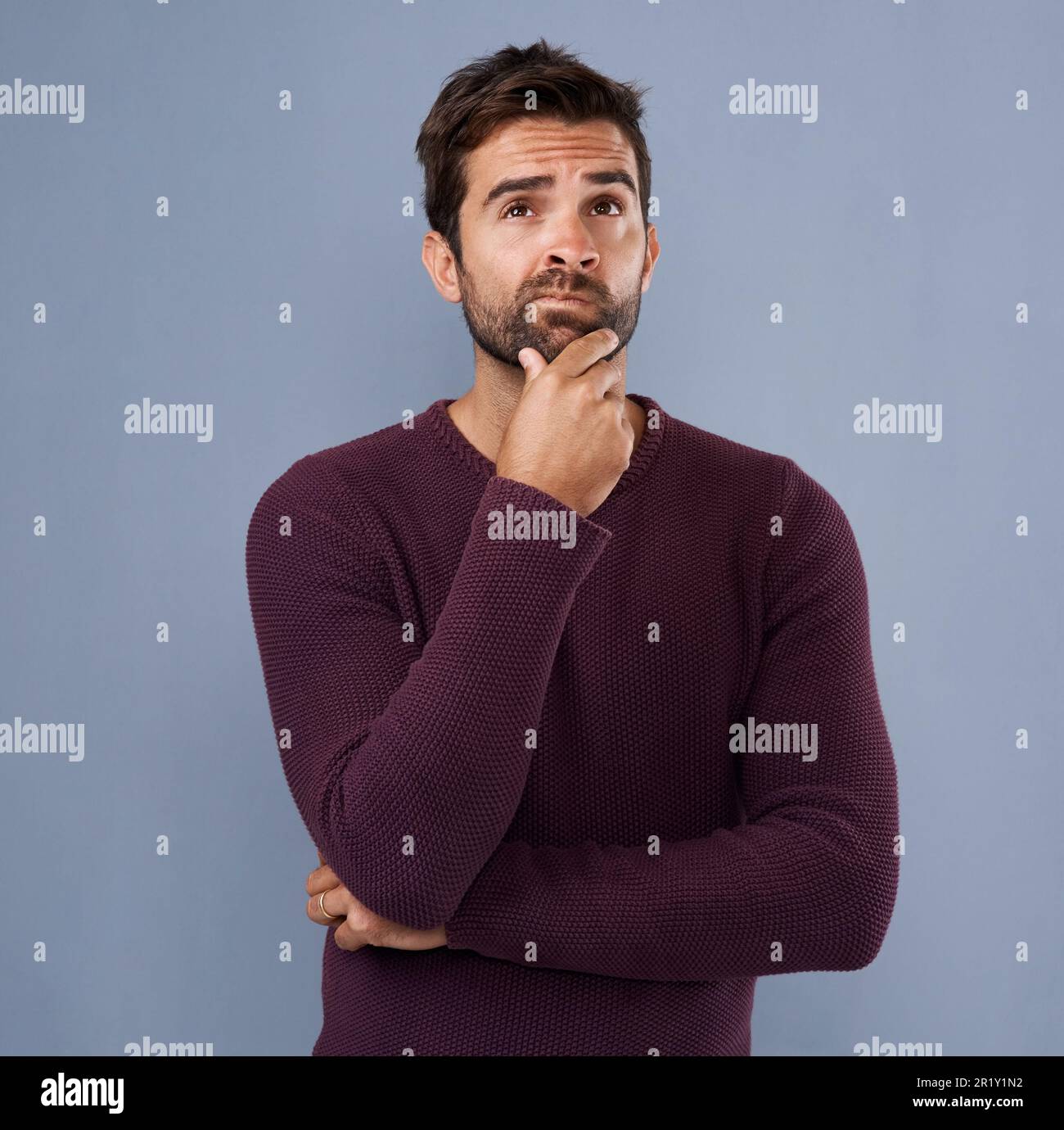 Thinking, confused and face of man in studio with unsure, uncertain and ...