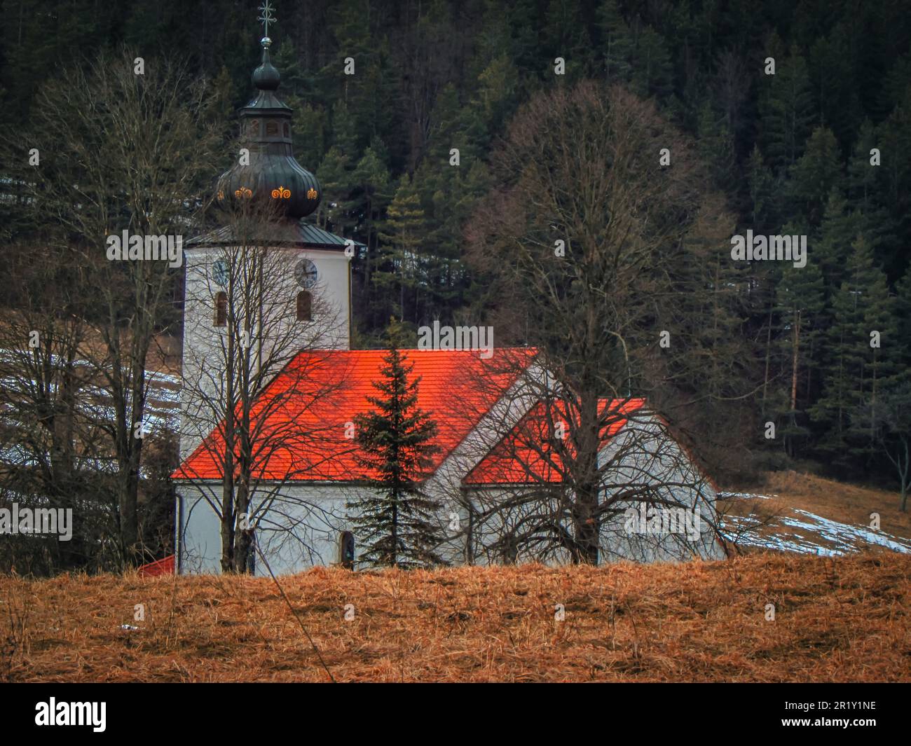Church built behind the hill Stock Photo - Alamy
