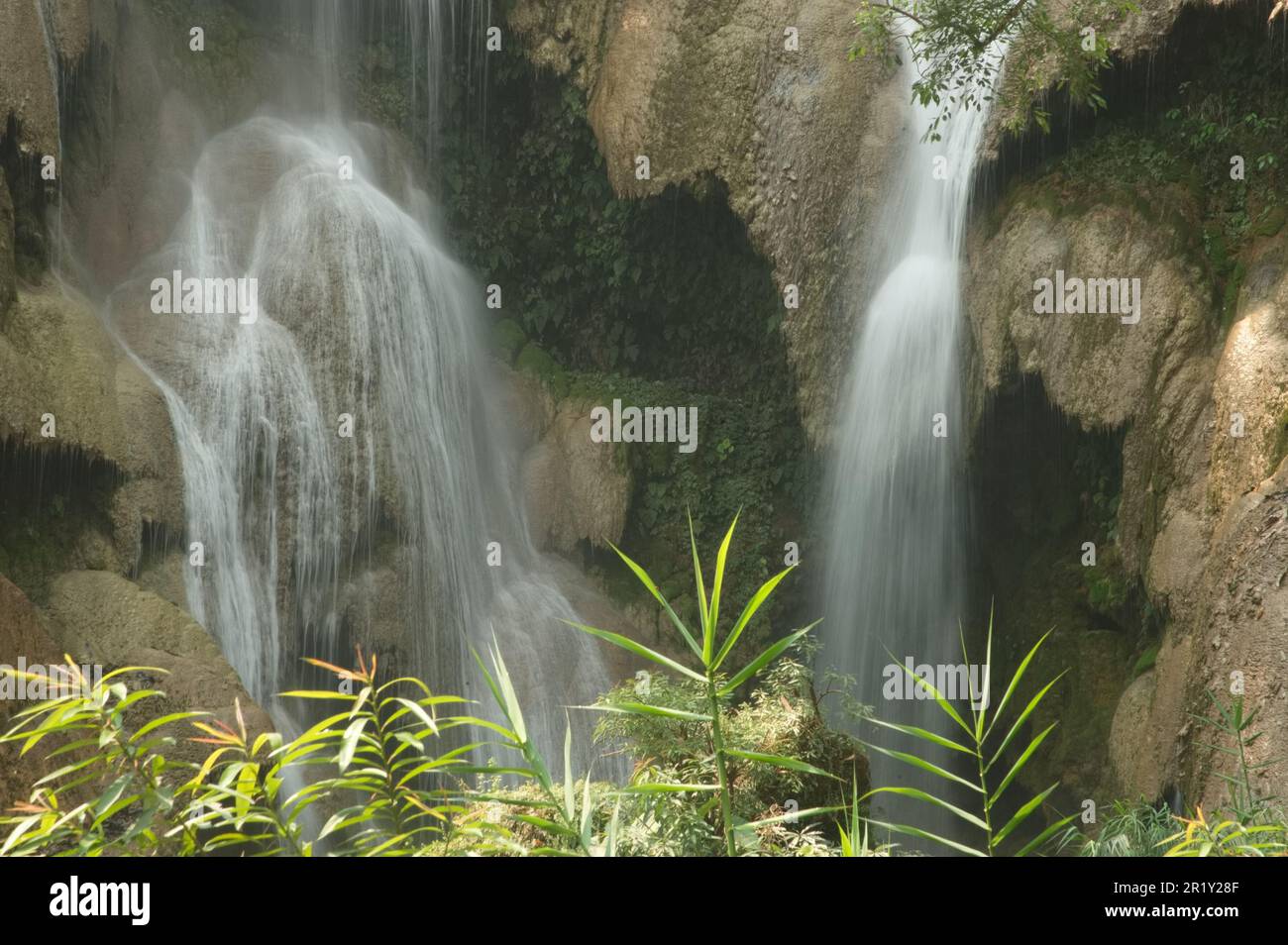 Tat Kuang Si Waterfalls is a limestone waterfall emerald green Inside ...