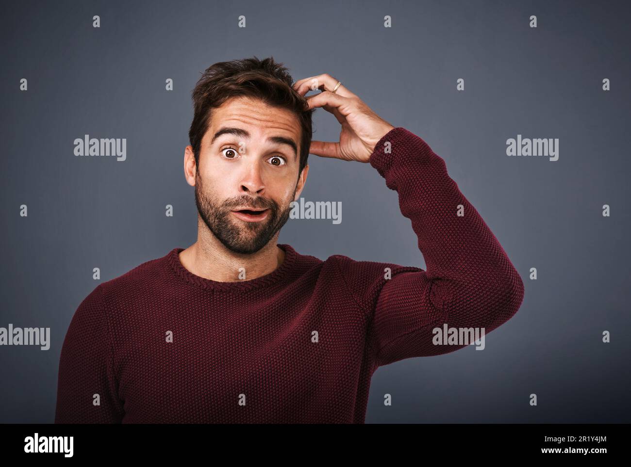 Confused, worry and portrait of man in studio with doubt, scratch head ...
