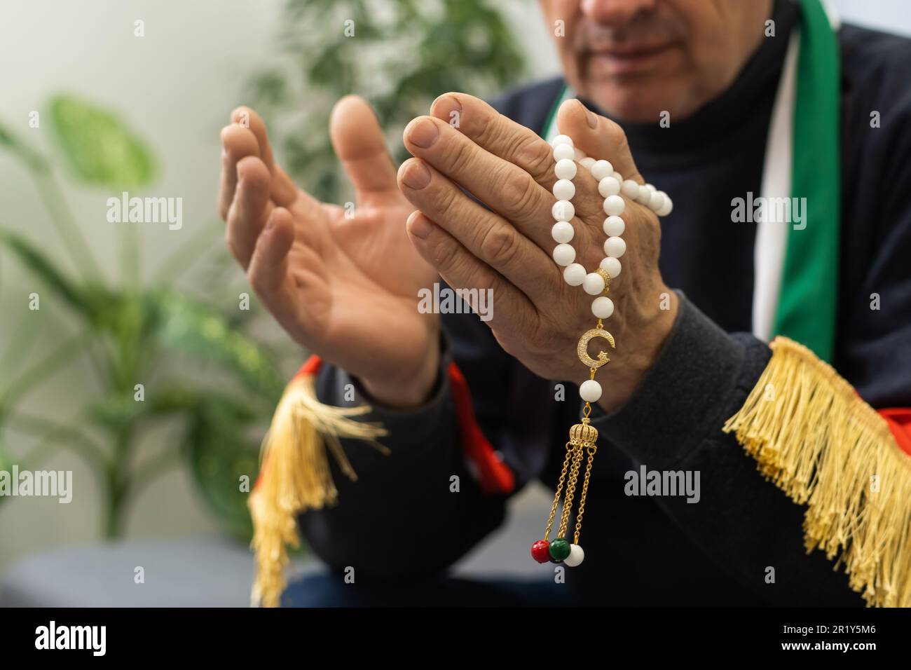 Elderly Muslim Arabic man praying Stock Photo - Alamy