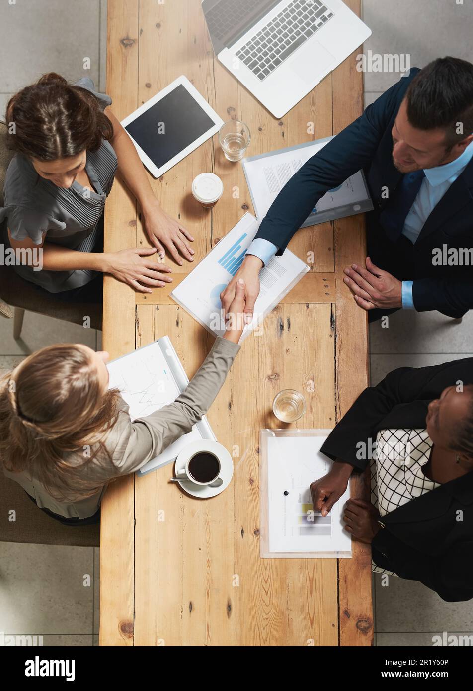 Business meeting, handshake and thank you of partnership deal from top ...
