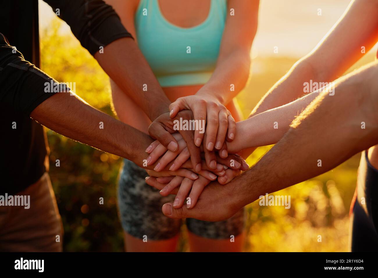Hands together, fitness friends and outdoor with motivation, workout ...