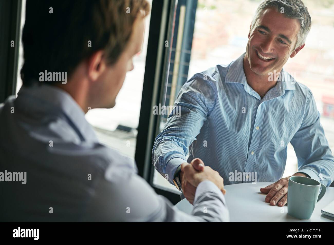 Business man, handshake and meeting for happy deal, collaboration or ...