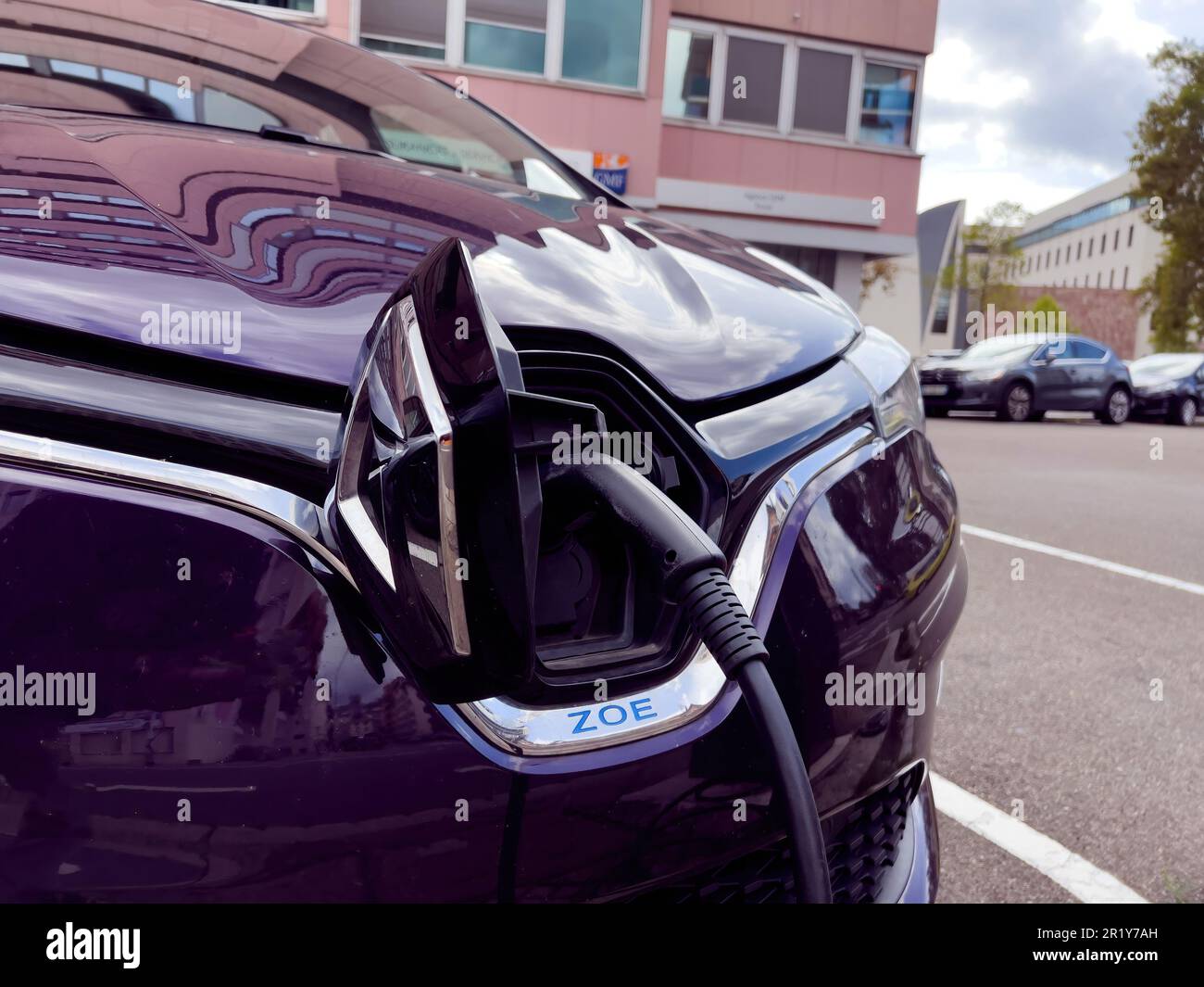 Paris, France - Sep 18, 2022: A black cable is connecting a new Renault ...