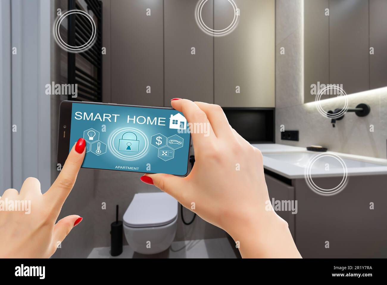 Remote home control system on a phone Stock Photo - Alamy