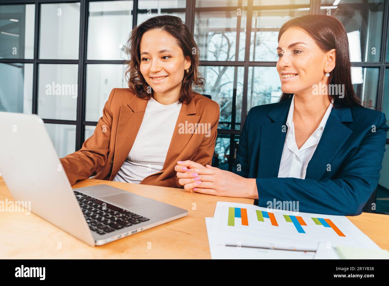 Group of business people have a meeting about company stats Stock Photo ...