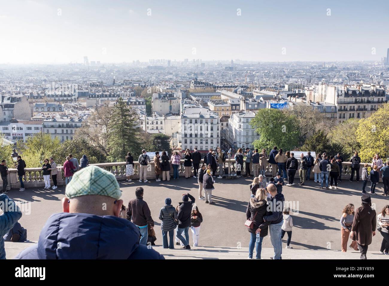 Tourists from around the world look at the view over Paris from the ...