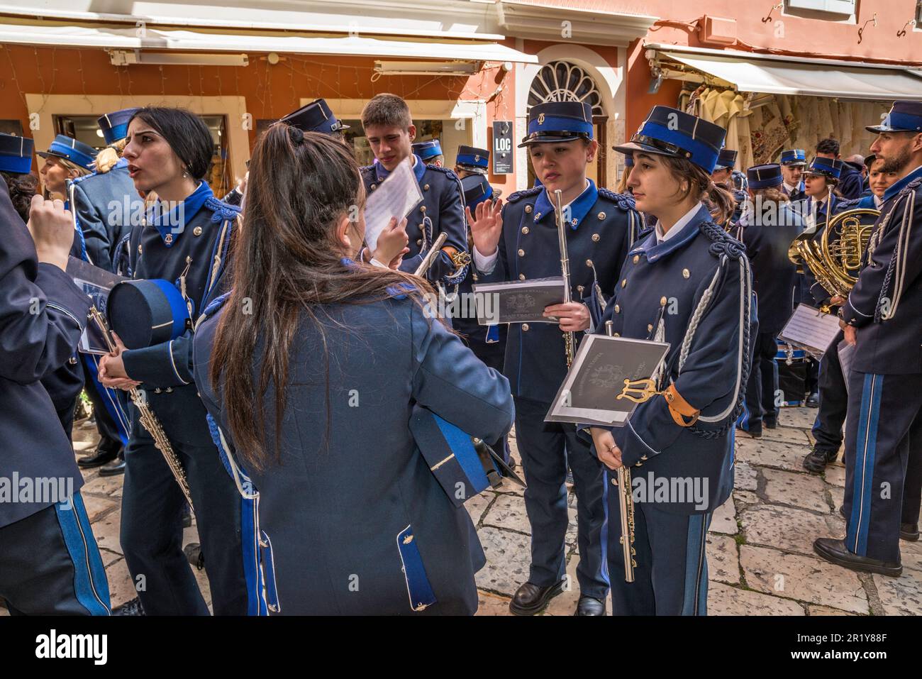 Young musicians, Mantzaros marching band ready to perform, talking, in ...