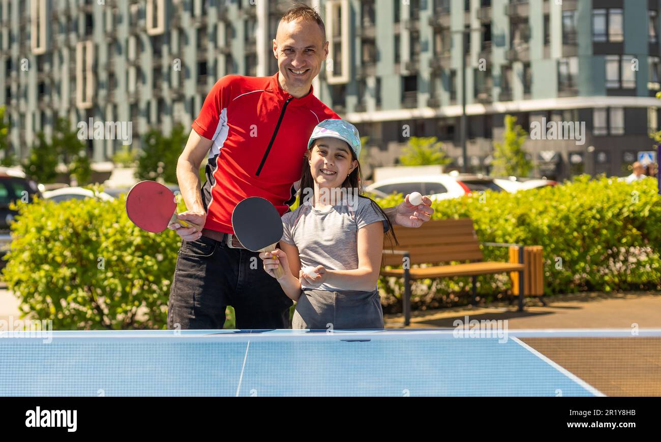 Family mother son playing tennis hi-res stock photography and images ...