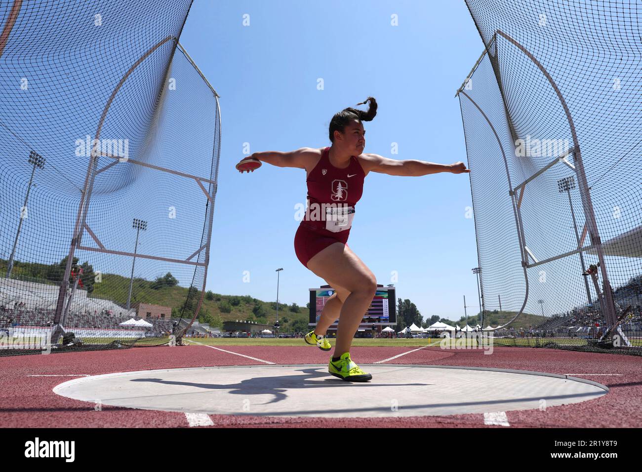 Brandy Atuatasi of Stanford throws in the women's discus during the Pac ...