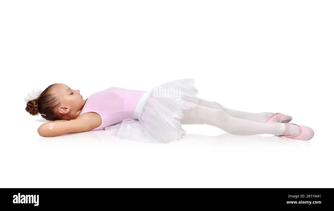 tired ballet dancer lying on the floor on white background Stock Photo ...