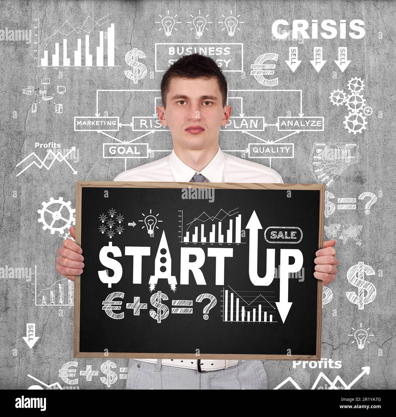 businessman holding chalk board with drawing start up concept Stock ...