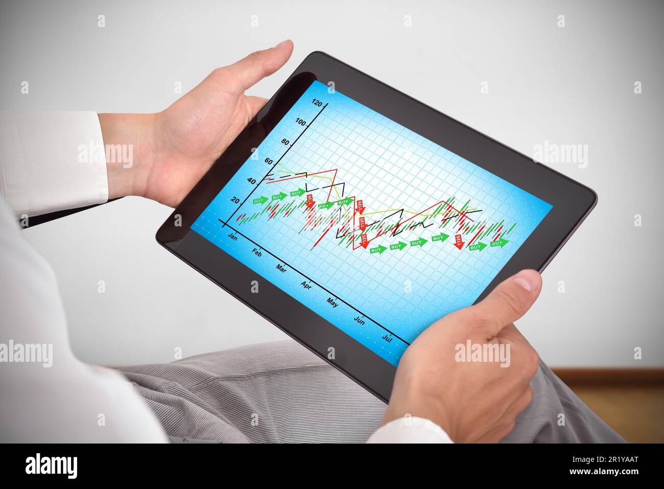 businessman holding digital touch pad with chart Stock Photo - Alamy