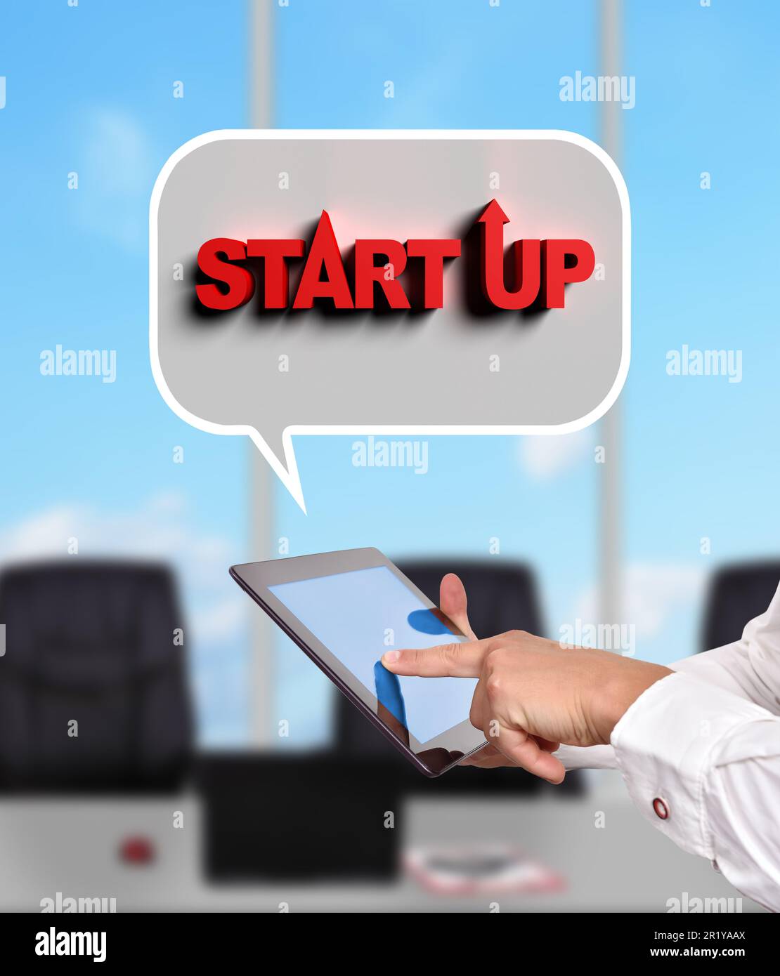 businessman touching digital tablet and think box with start up symbol ...