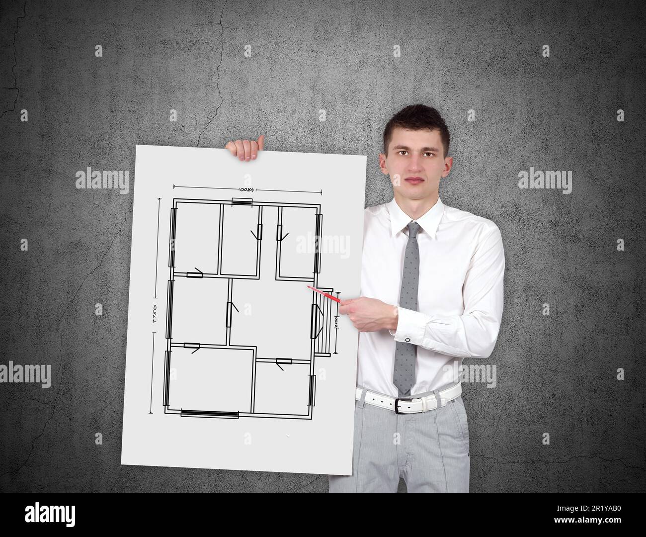 young businessman holding placard with drawing blueprint Stock Photo ...