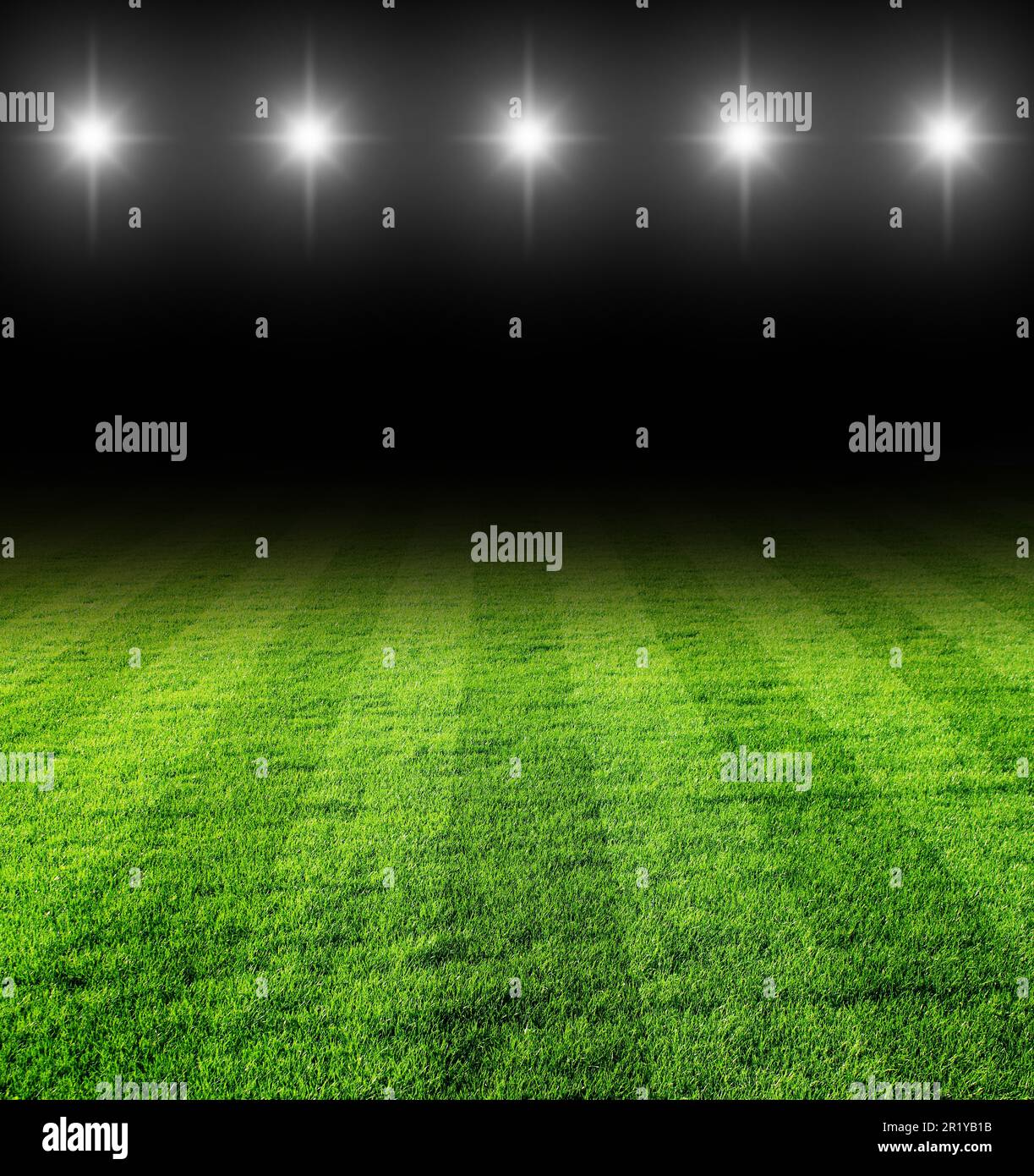 Green soccer field, bright spotlights, illuminated stadium Stock Photo ...