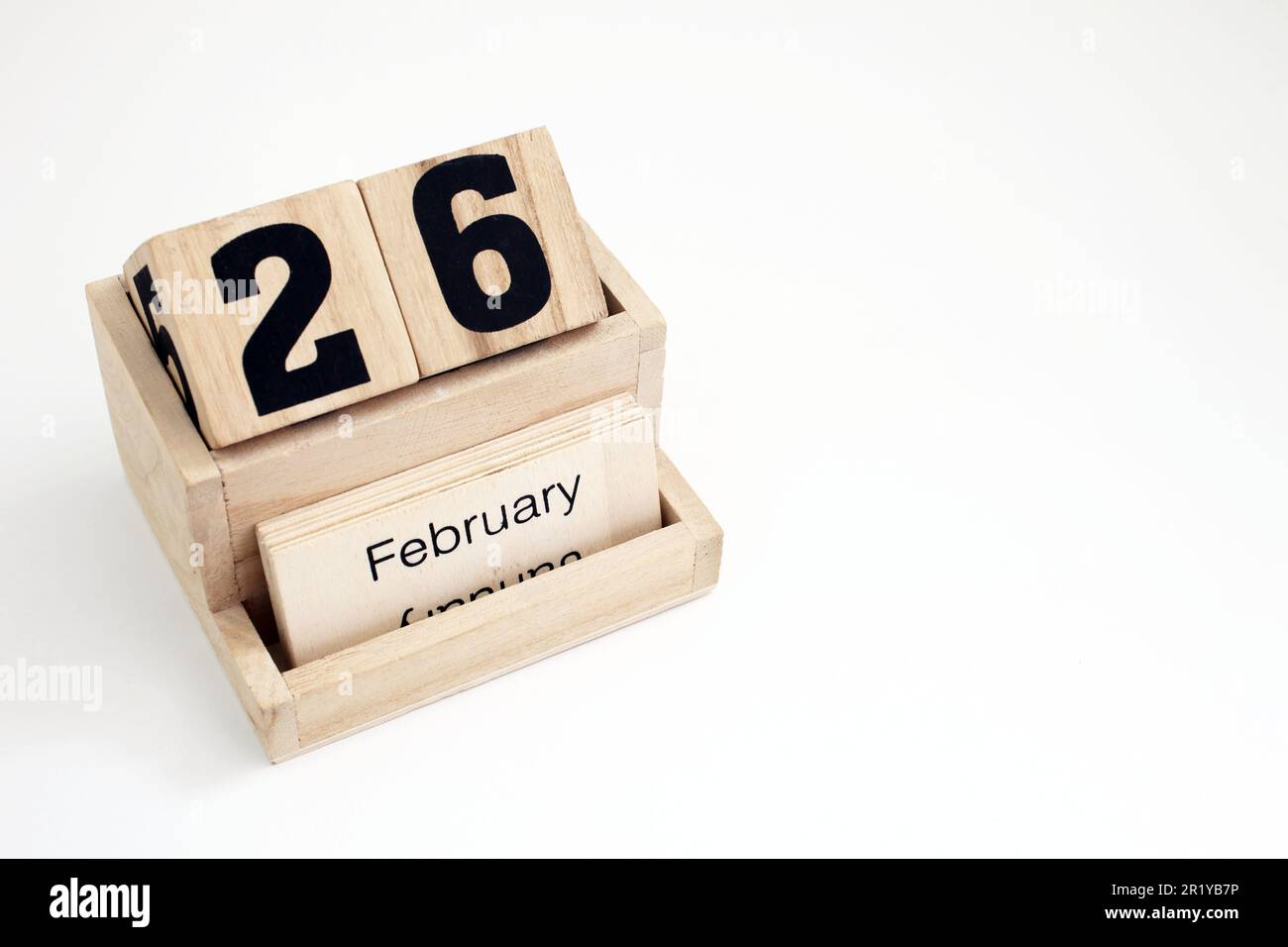 Wooden perpetual calendar showing the 26th of February Stock Photo - Alamy