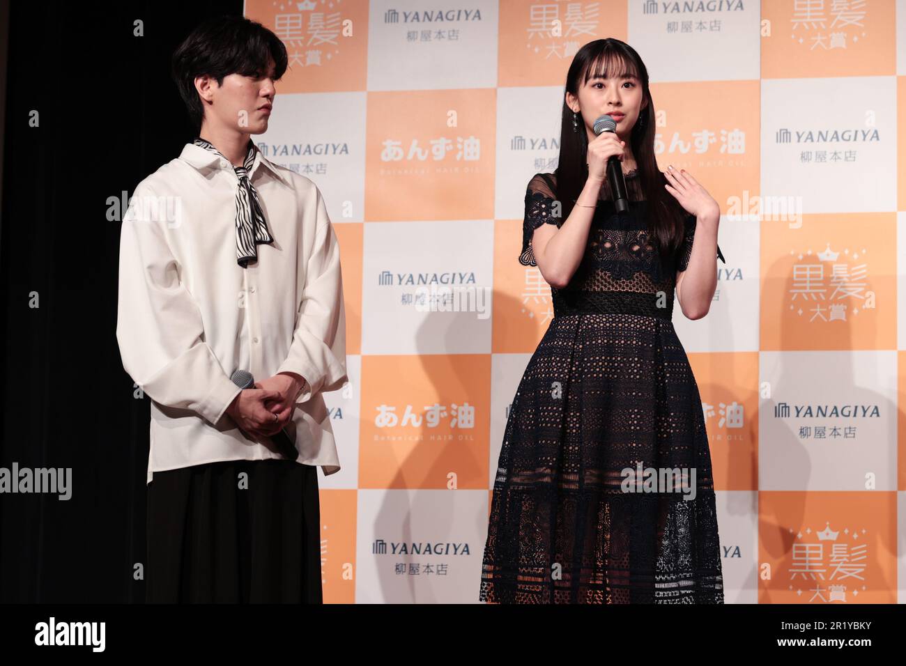 Tokyo, Japan. Tuesday. 16th May, 2023. (L-R) Model Yohdi Kondo, Actress ...