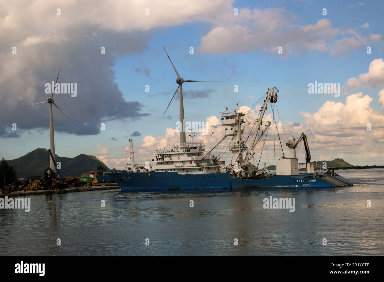 Seychelles, Mahe, the harbour with wind turbines in the back ground ...