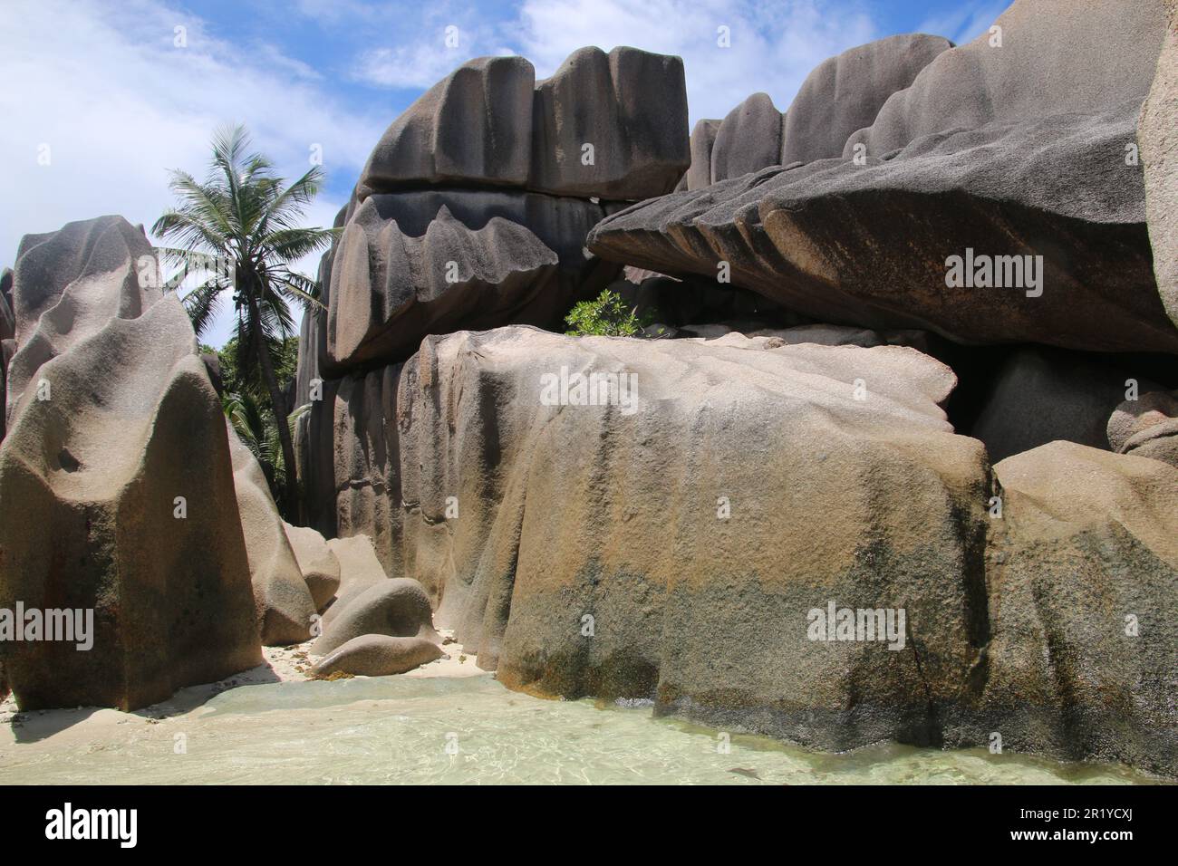Eroded granite. The action of waves over countless millennia has shaped ...