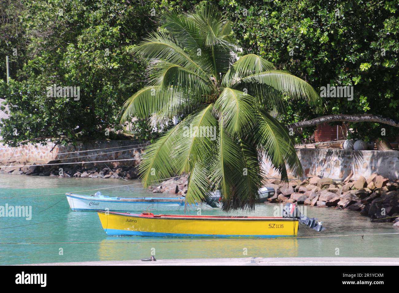 Boat in in a lagoon Seychelles Stock Photo - Alamy