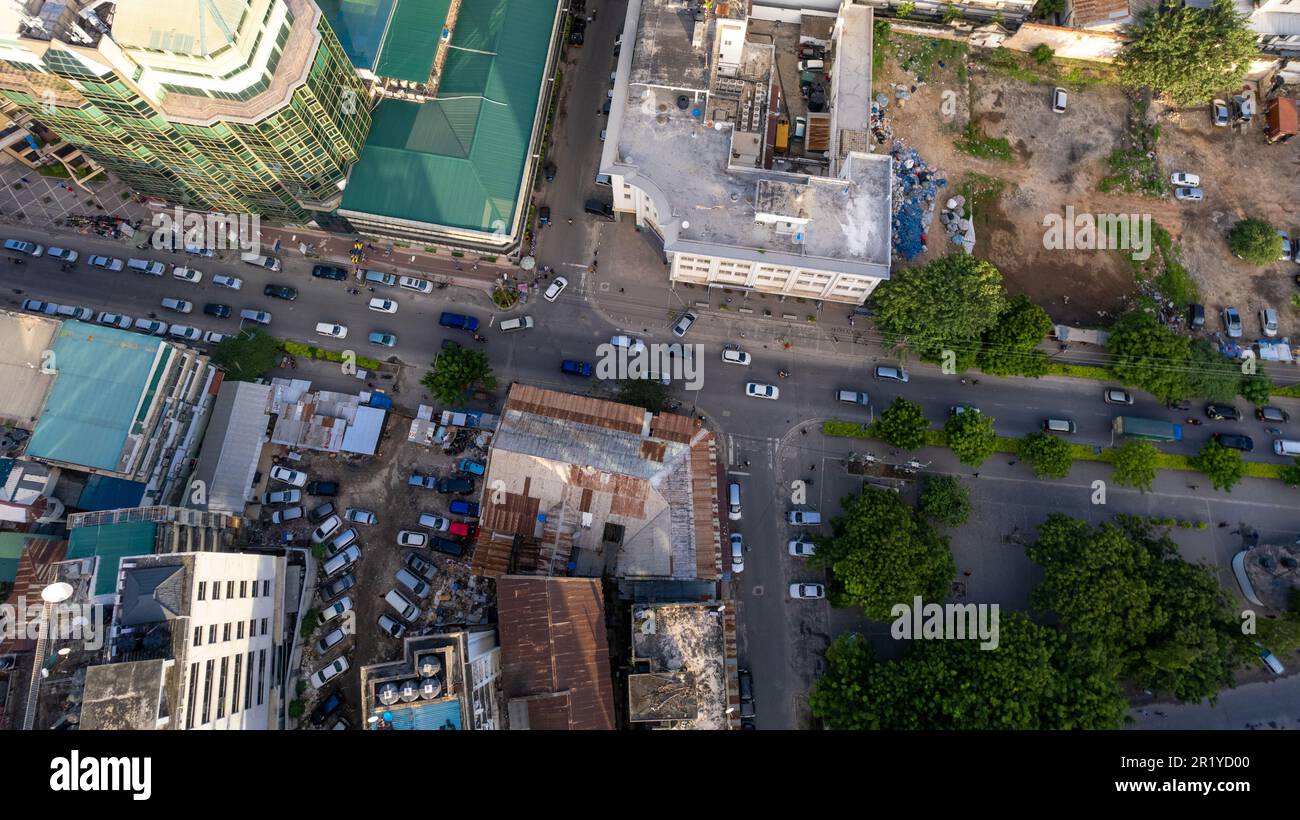A bustling cityscape with a busy street filled with various forms of ...