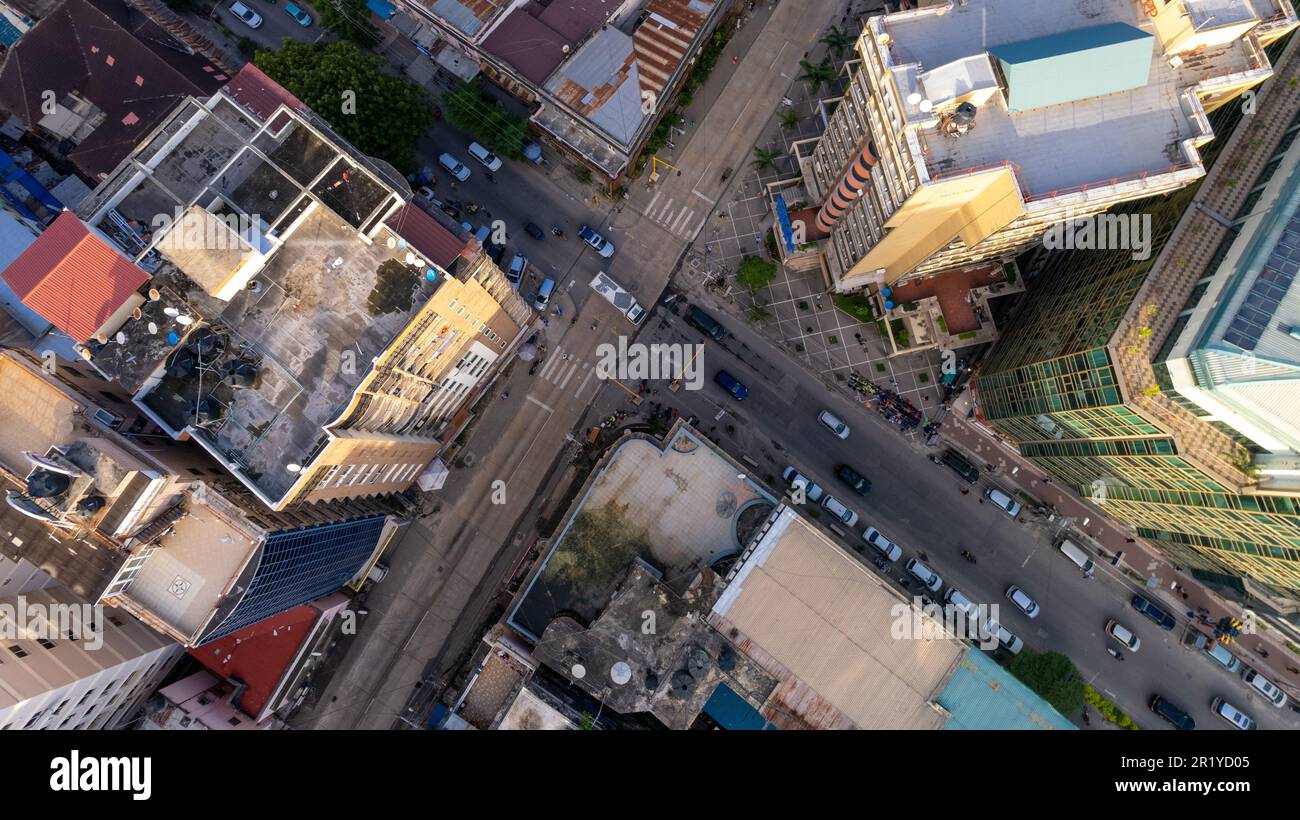 An aerial view of a sprawling cityscape with numerous buildings and a ...