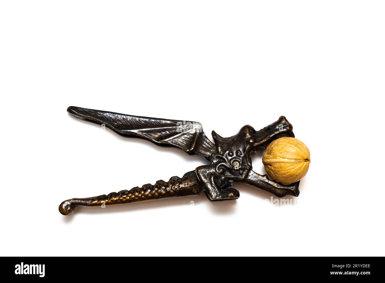 hand nut cracker for walnuts on a white background. nut cracker in the ...