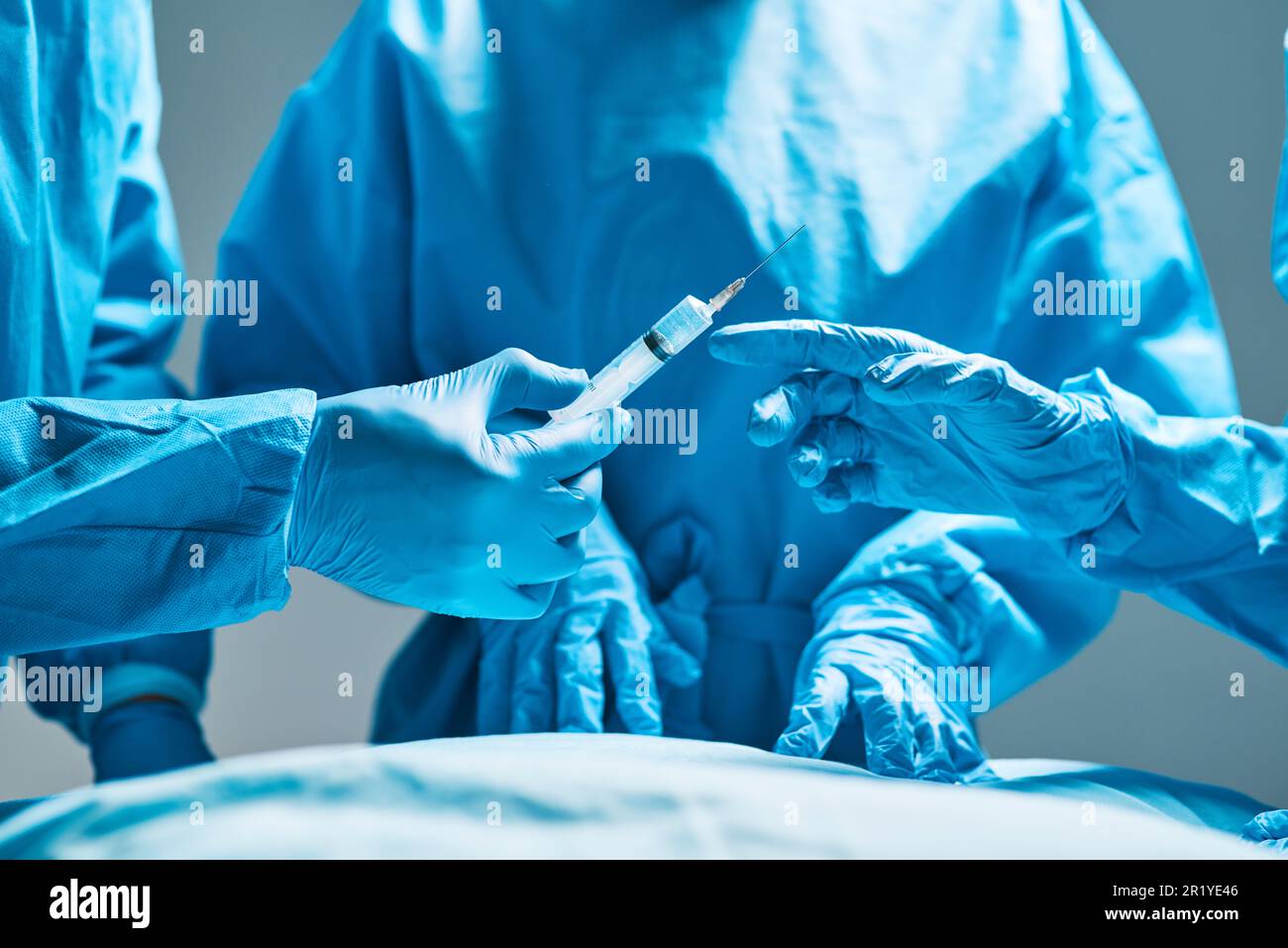 Surgery, operating room and hands of doctor with needle for healthcare ...