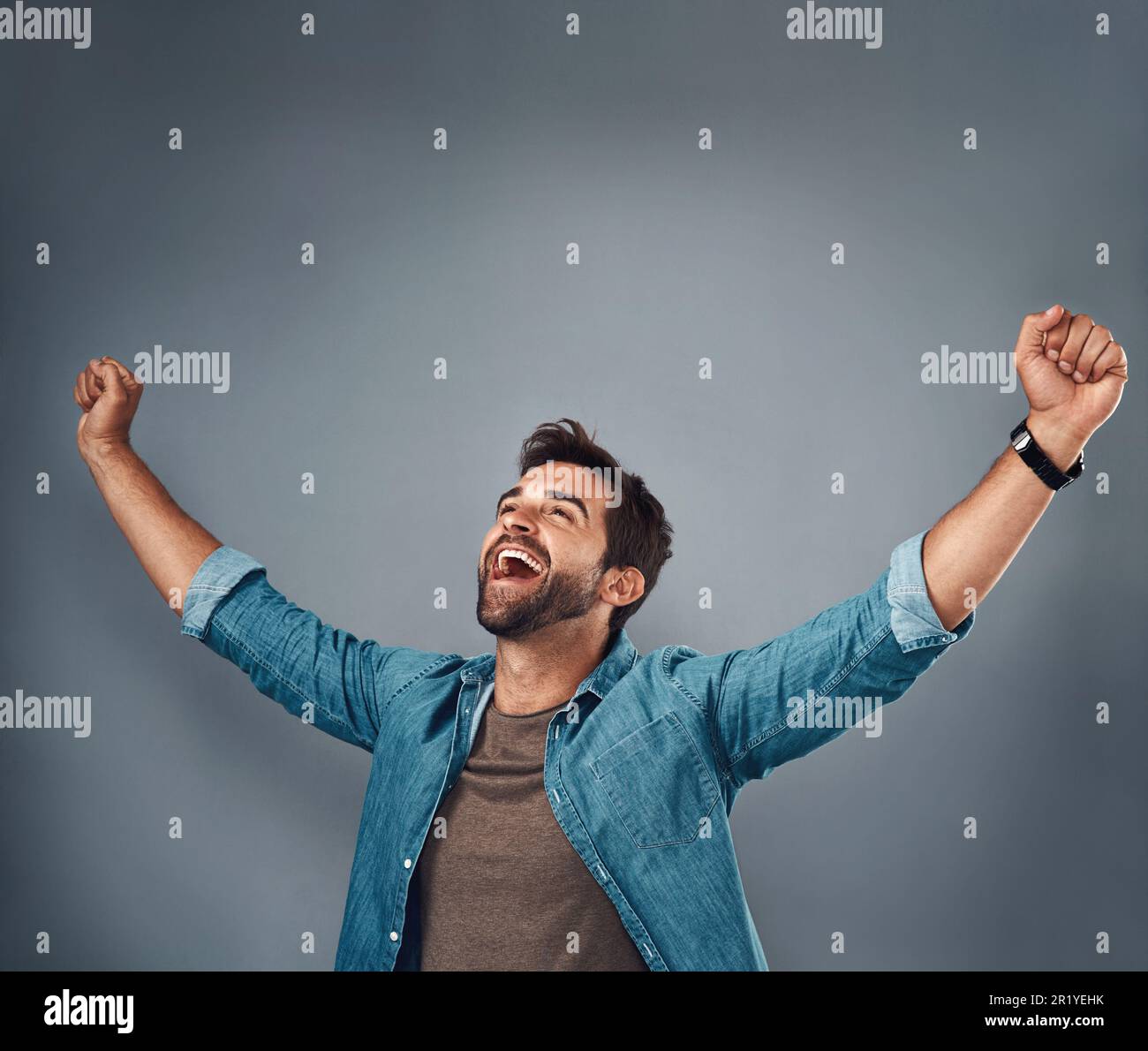 Happy man, fist and celebration for winning, success or achievement ...