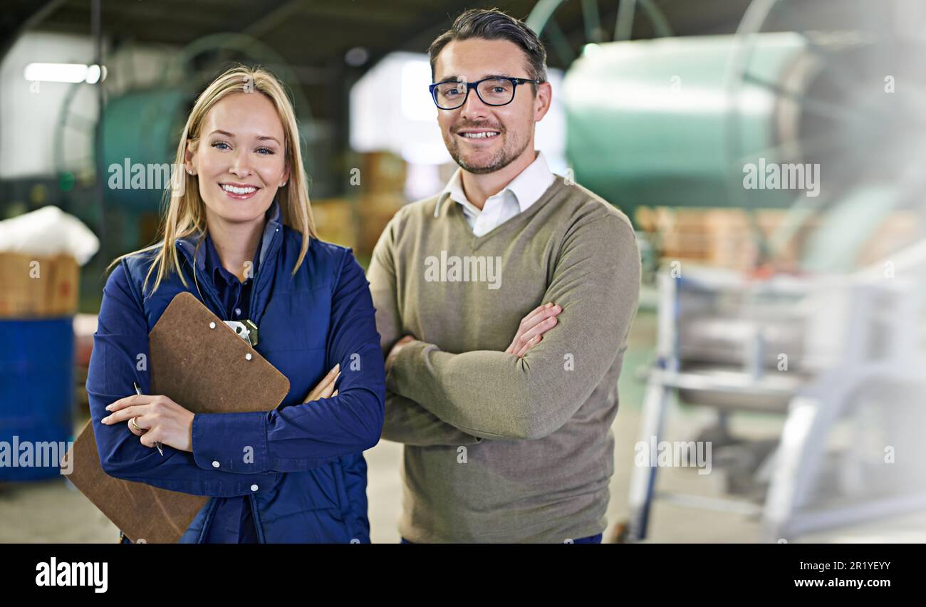 You can depend on us. Portrait of a two smiling managers standing on ...
