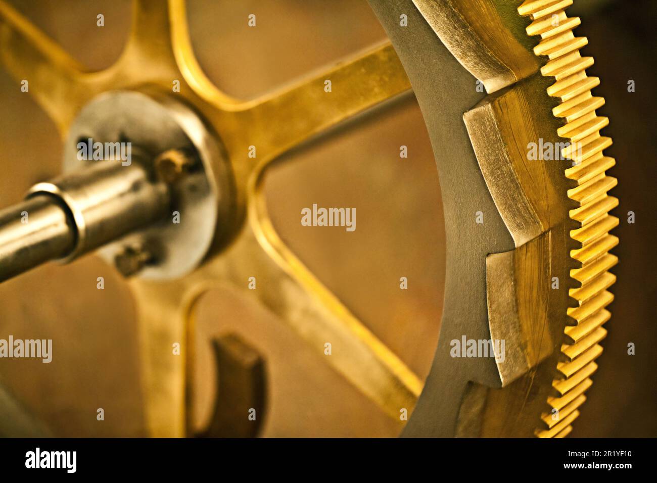 Golden cog wheels hi-res stock photography and images - Alamy