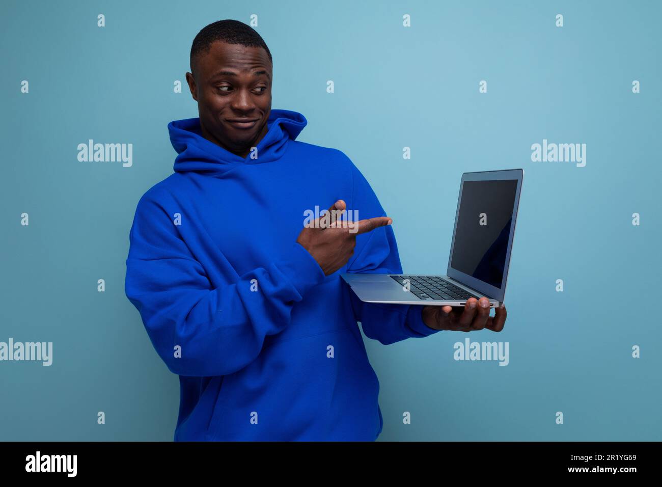 handsome successful african man young laptop user checks the work of ...