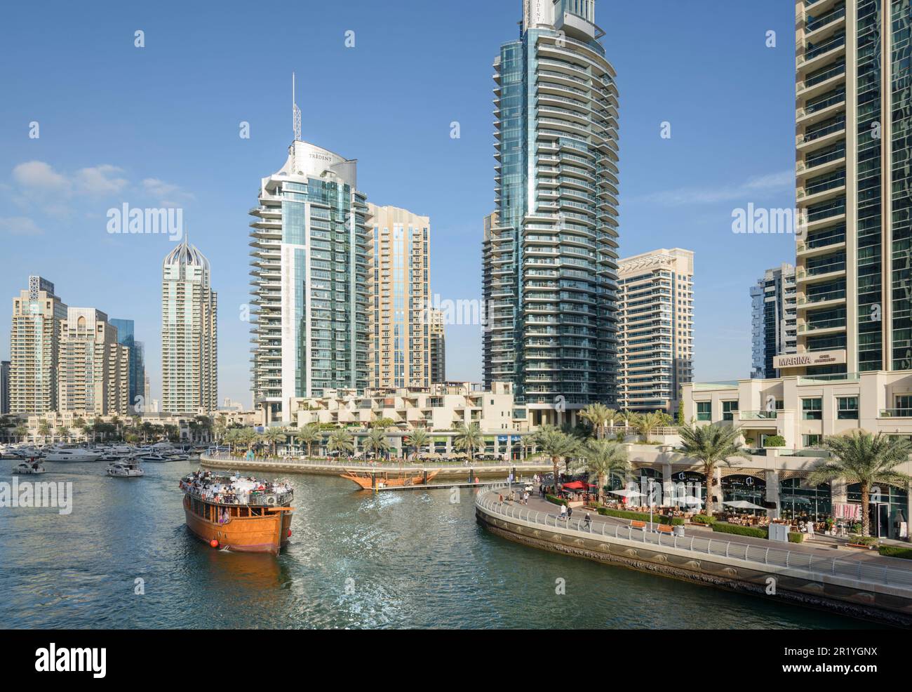 Dubai Marina is a man-made waterfront district with skyscrapers, luxury ...