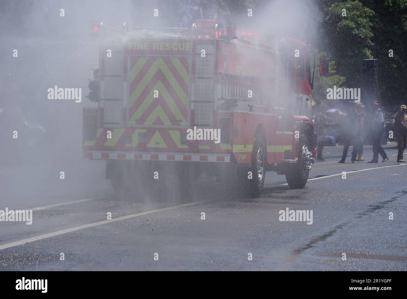 Red fire truck on the road Stock Photo - Alamy