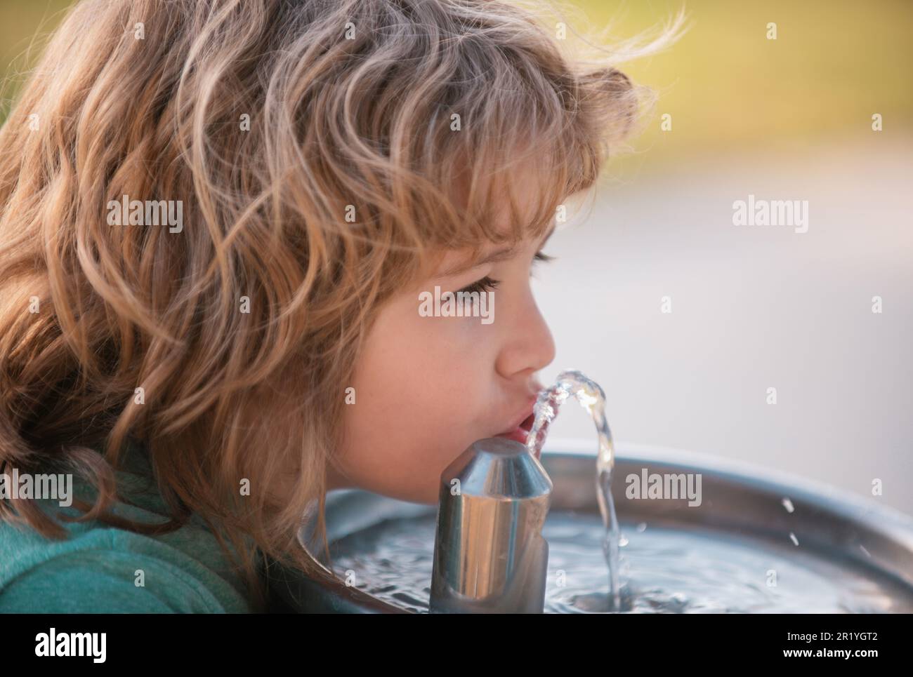 Kid Drinking Water Fountain