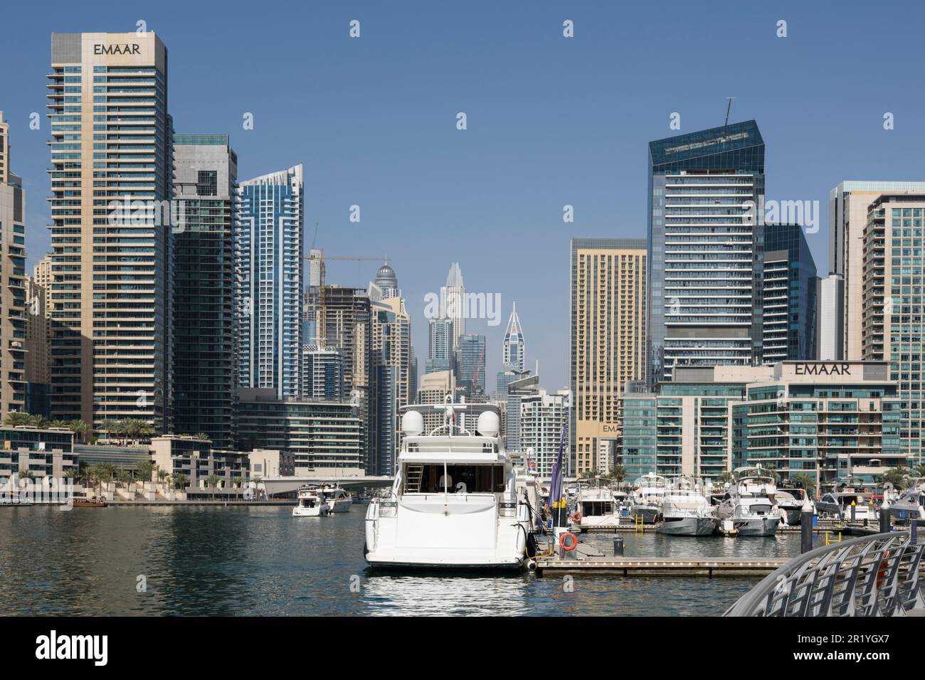Dubai Marina is a man-made waterfront district with skyscrapers, luxury ...